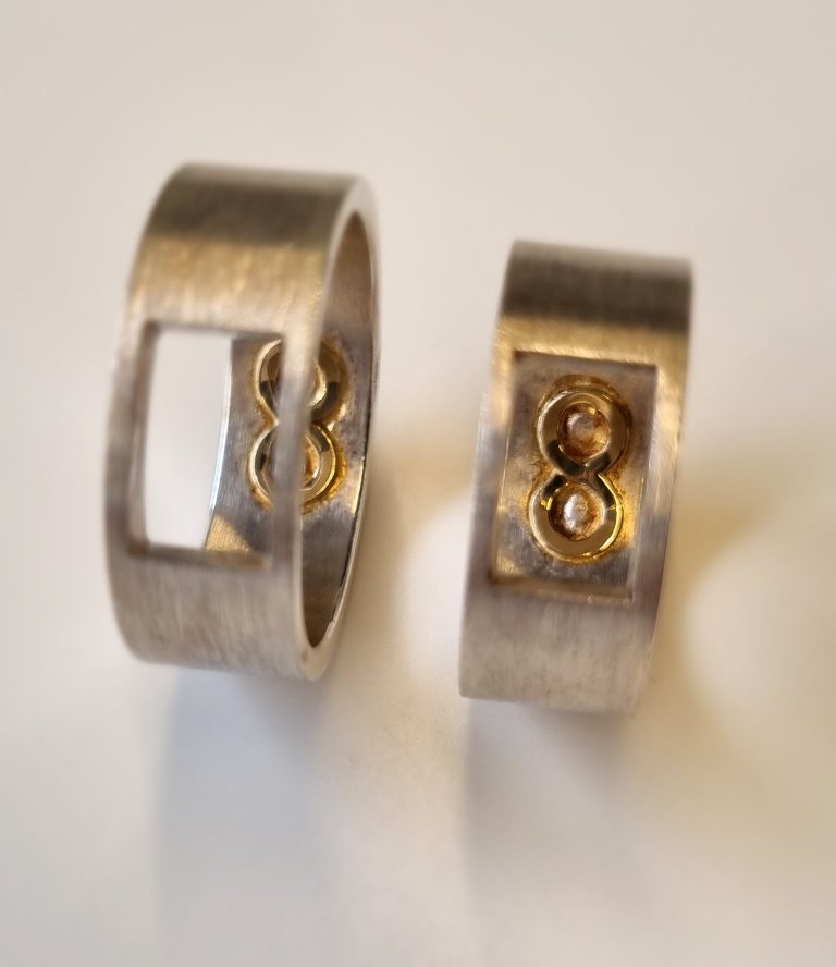 Beach Trouwringen - Facet Design